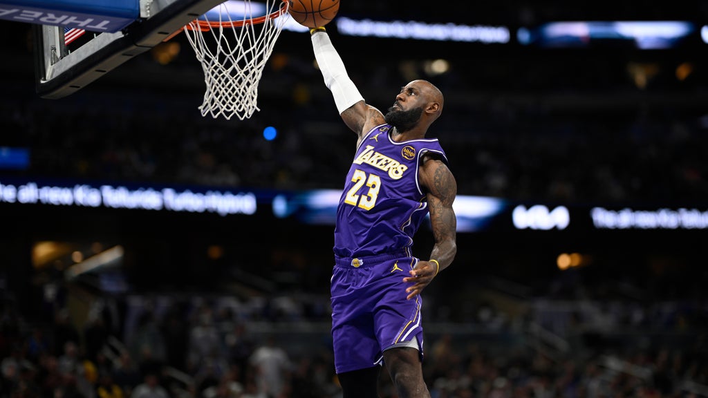 LeBron James breaks NBA mark for games played in Lakers' win over Magic
