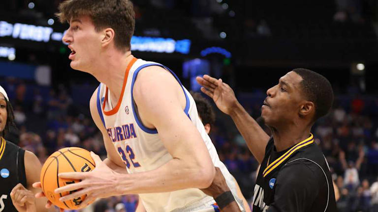 7-foot-9 Olivier Rioux makes viral buff Florida fan look tiny towering ...
