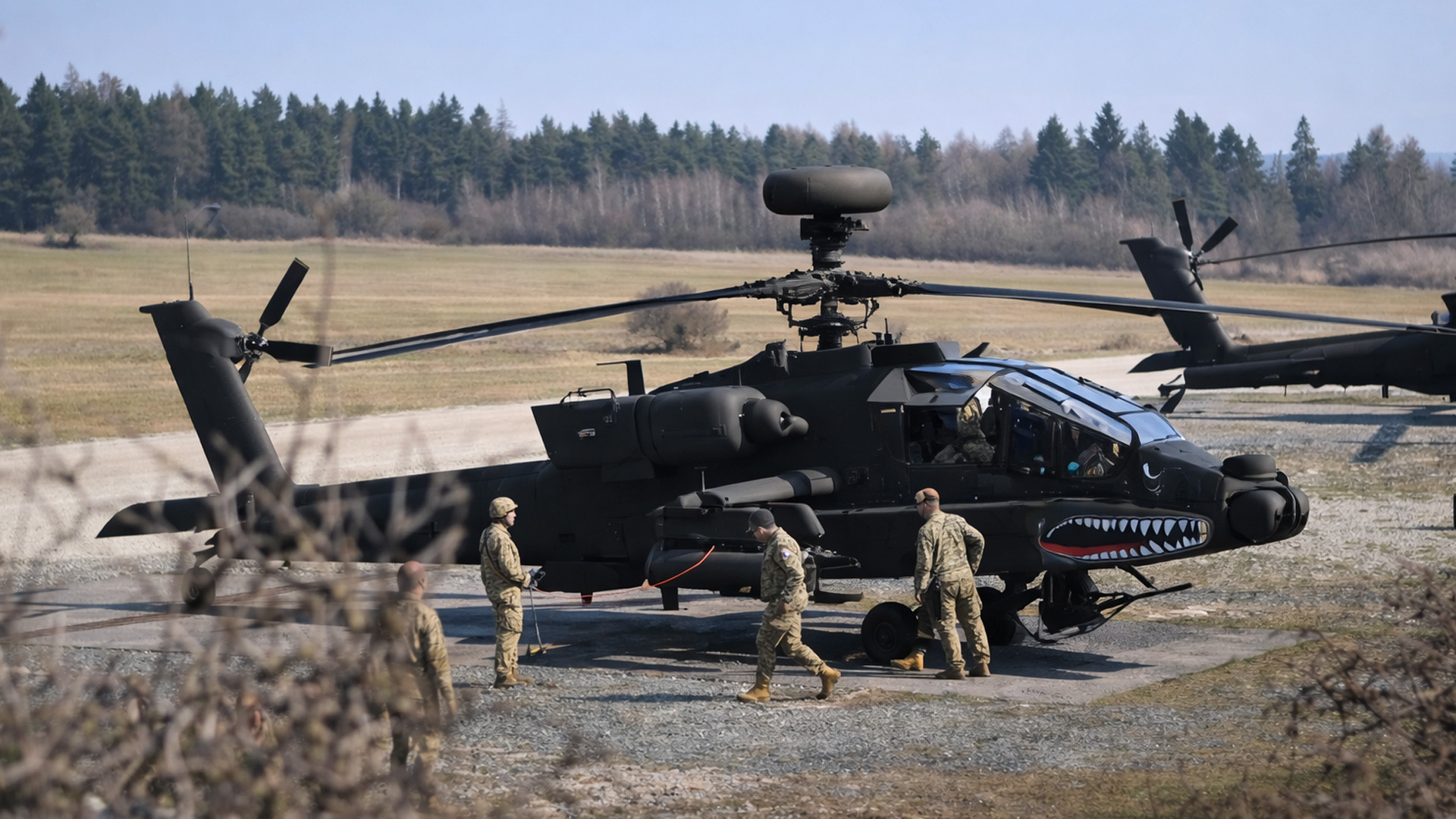 US Army Apache helicopter takes down drones