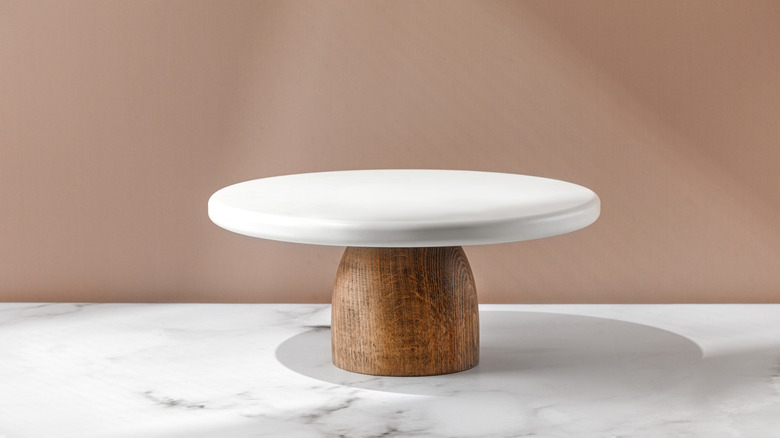 Reuse an old cake stand for simple and stylish countertop storage