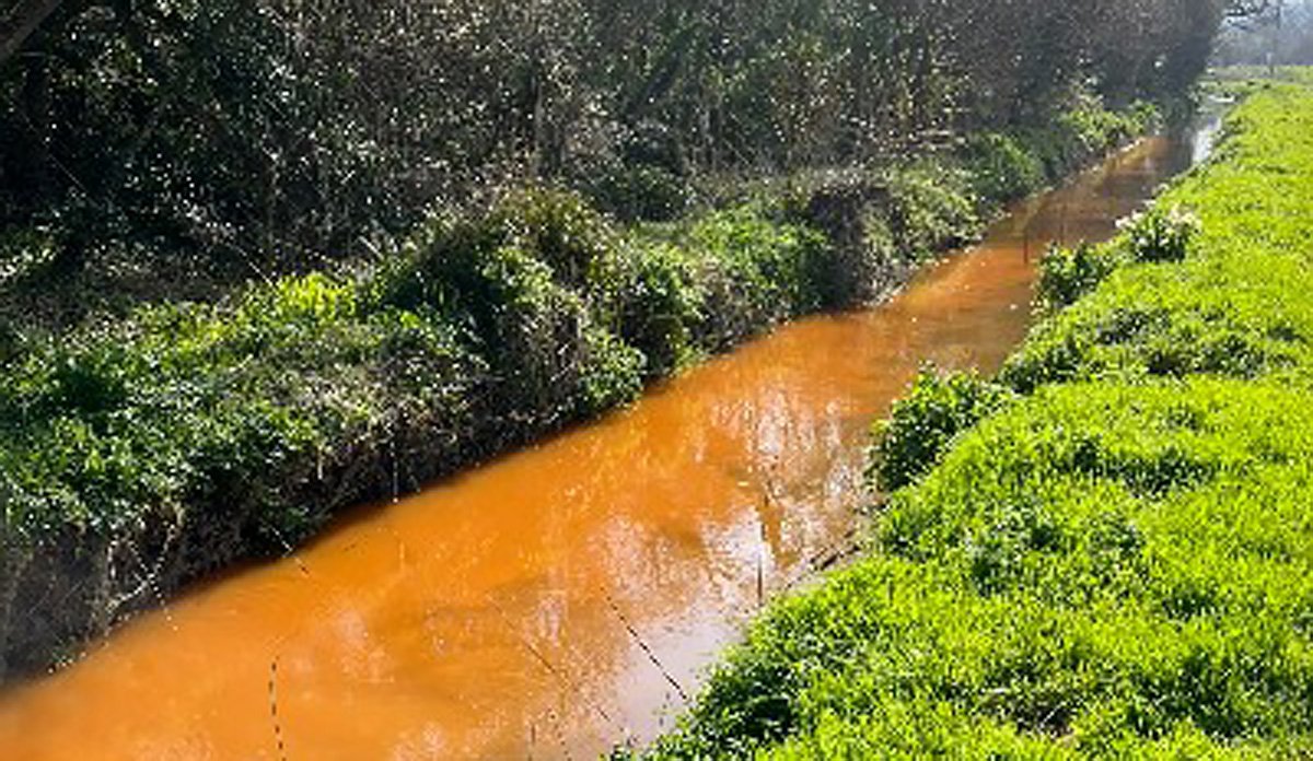 Experts baffled after stream in Cornwall turns bright orange