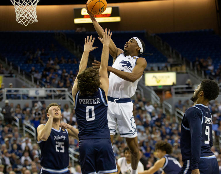 Furious rally lifts Nevada past Liberty 73-63 in NIT second round