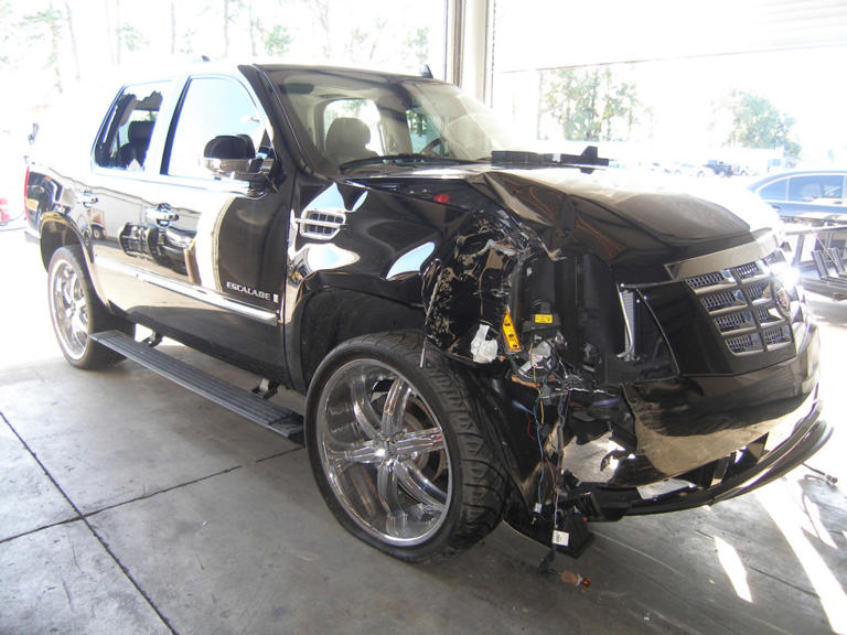 Tiger Woods rolls over his Range Rover and is charged with DUI in Florida