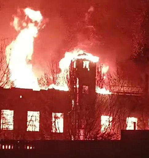 Flames light up sky after fire rips through historic Grade II building