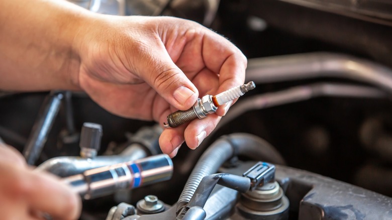 What tools do you need to change a spark plug?