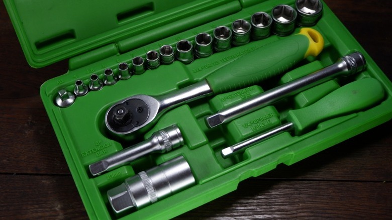 What tools do you need to change a spark plug?