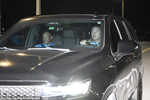 Tiger Woods is released from jail after eight hours behind bars as ...