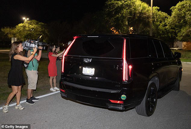 Tiger Woods is released from jail after eight hours behind bars as ...