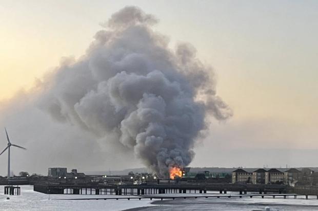 Warning to 'avoid the area' as fire breaks out at scrap metal yard in Erith