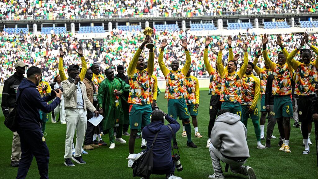 Senegal parades AFCON trophy at match in France despite being stripped ...
