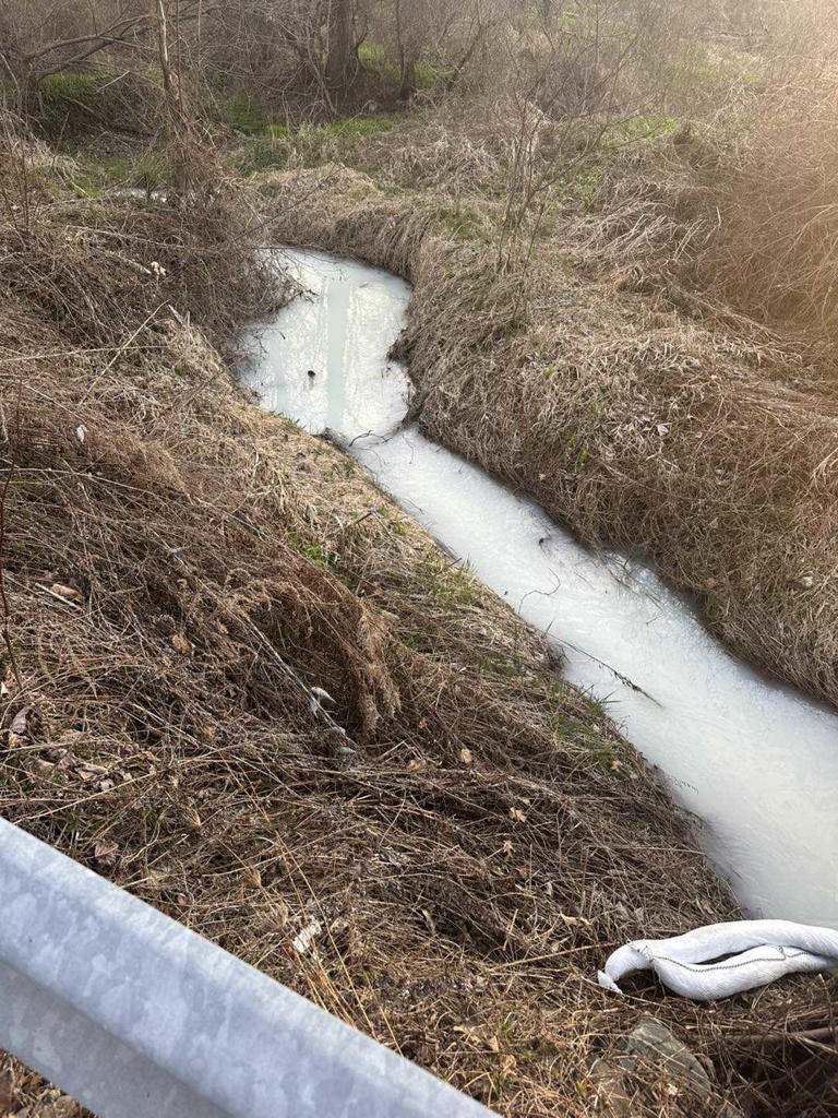 Tanker truck crash shuts down bridge, spills milk into nearby waterway