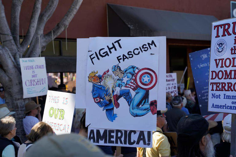Thousands rally for No Kings protest in downtown SLO. "Take action today"
