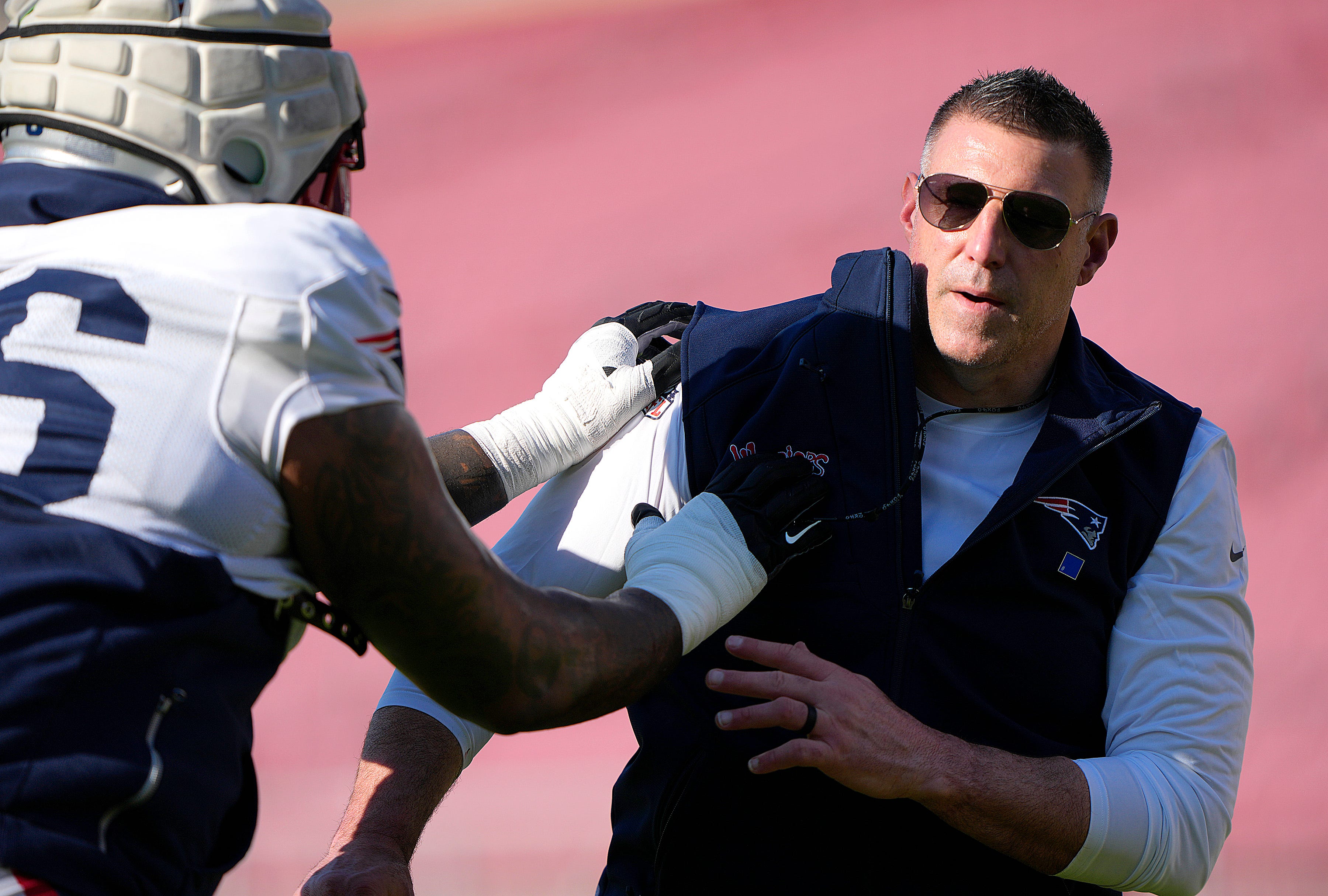 Mike Vrabel spotted getting hands on in workout with top OL prospect