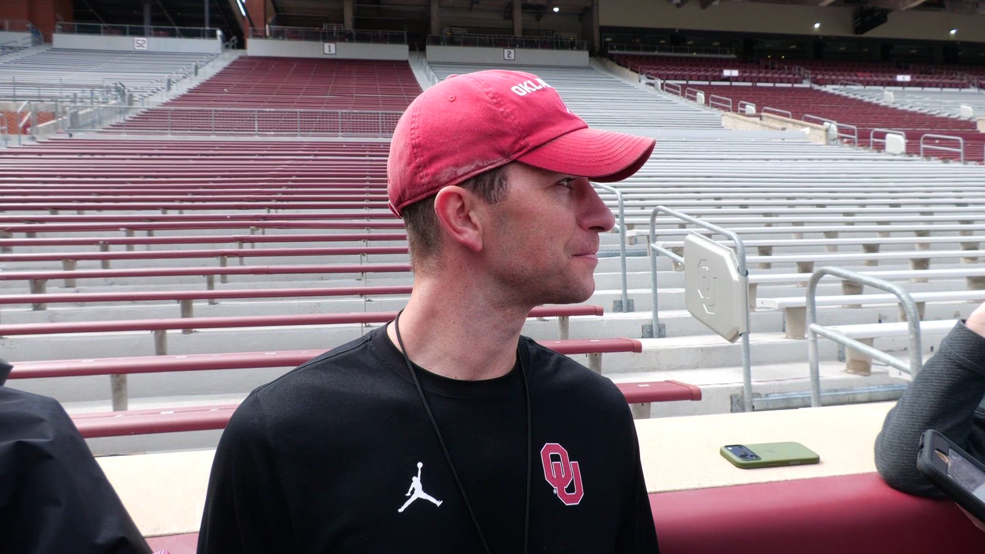 Oklahoma special teams coordinator Doug Deakin speaks to the media