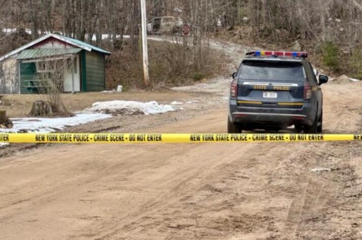 2 dead in 2 burned-out cars, suspect shot by police