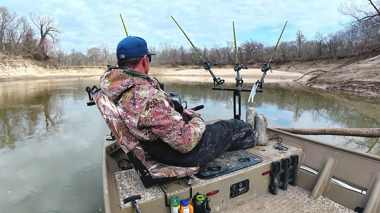 Fishing and cooking fresh catch on a remote river