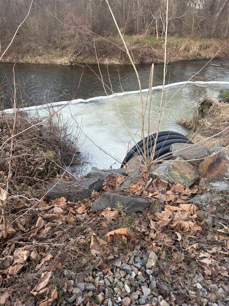 Tanker truck crash shuts down bridge, spills milk into nearby waterway