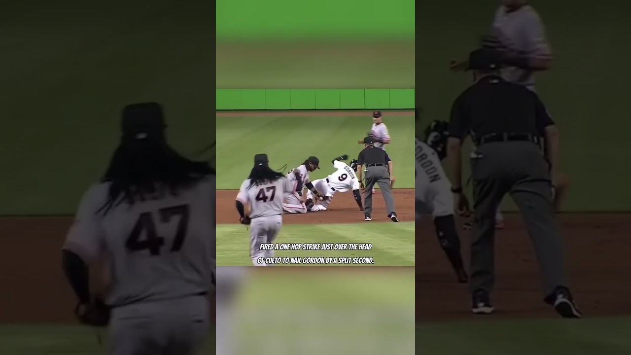 Buster Posey makes a sidearm throw to second base from his knees