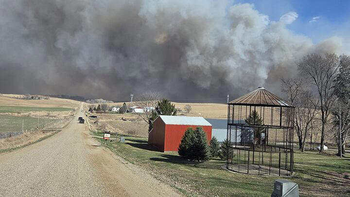 Western Iowa wildfire prompts evacuations, one person hurt