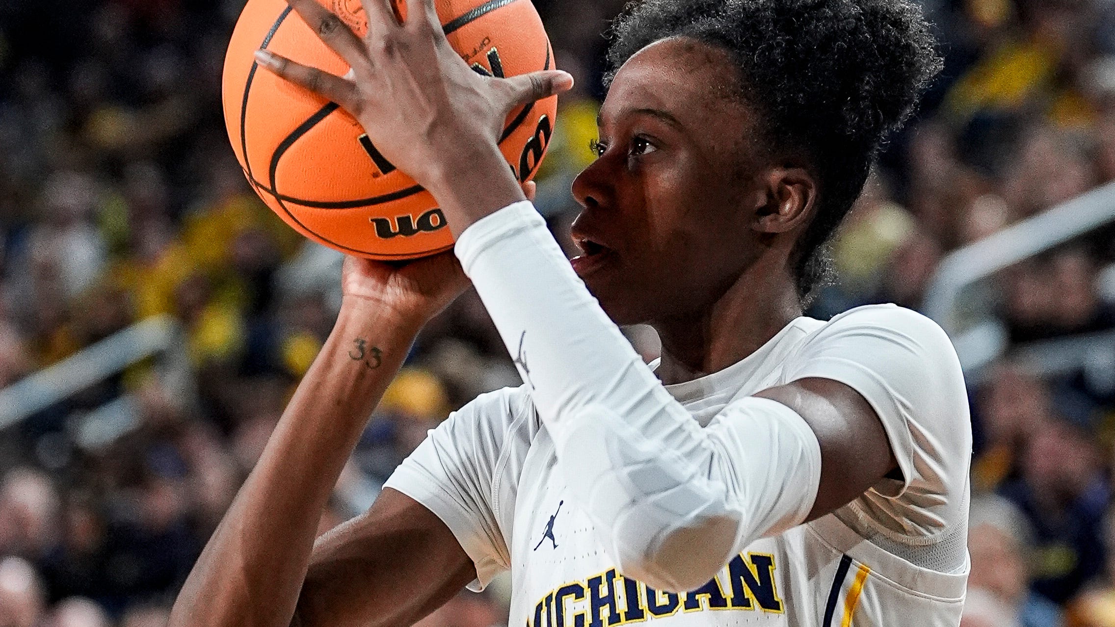 Michigan head coach Kim Barnes Arico says Te'Yala Delfosse is the ...