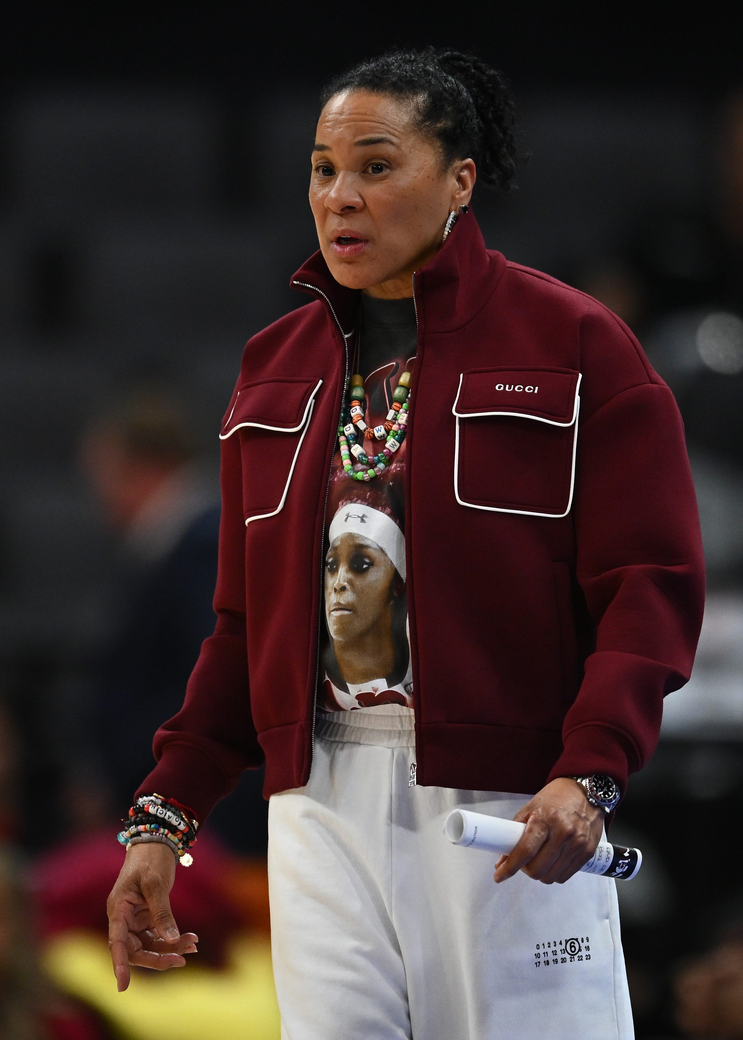 Raven Johnson reacts to seeing her face on Dawn Staley's shirt in South ...