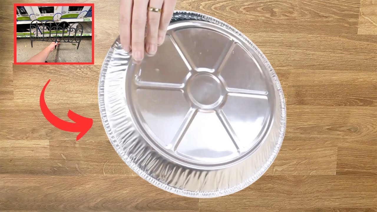 Stick a dollar store garden fence into a pie plate for this genius idea!