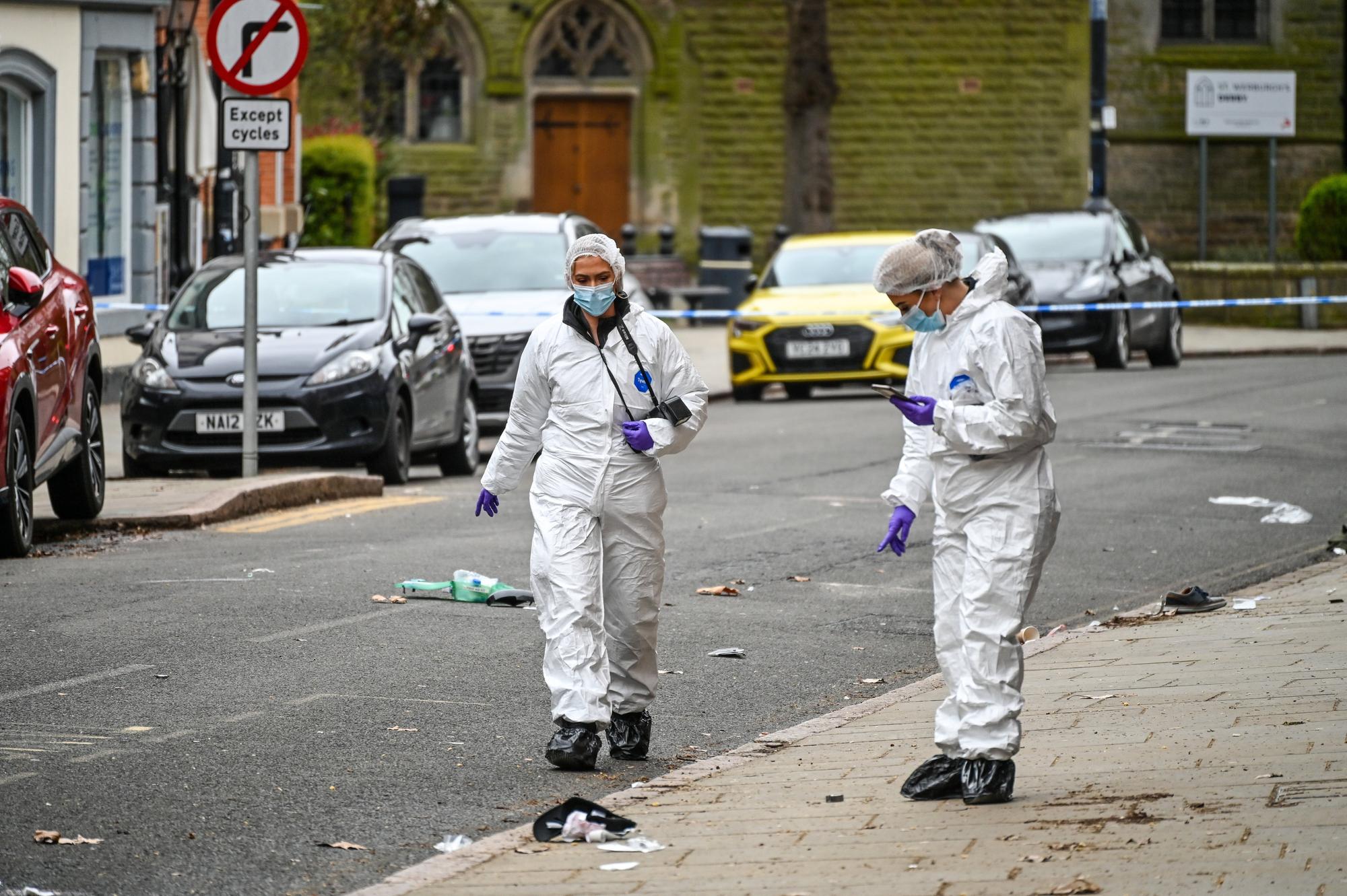 Man arrested on suspicion of attempted murder after pedestrians struck ...