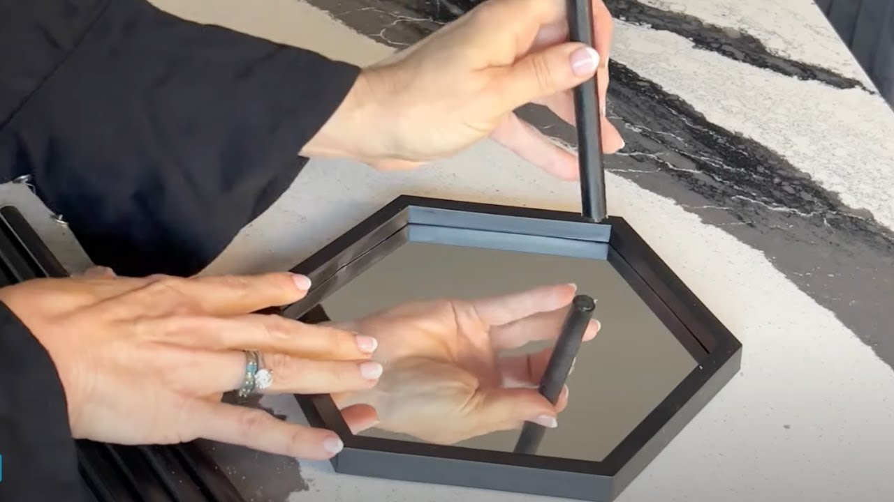 Grab 4 dollar store frames for this genius idea!