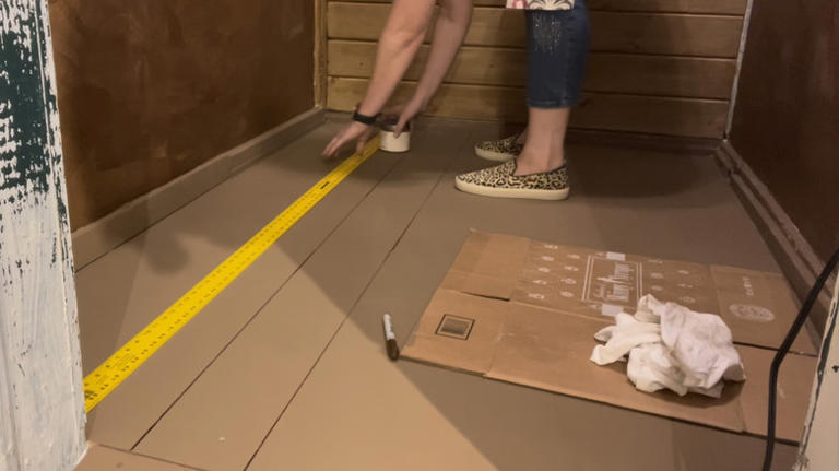 Homeowner gets creative to DIY hardwood floors on a budget: 'I faked them'