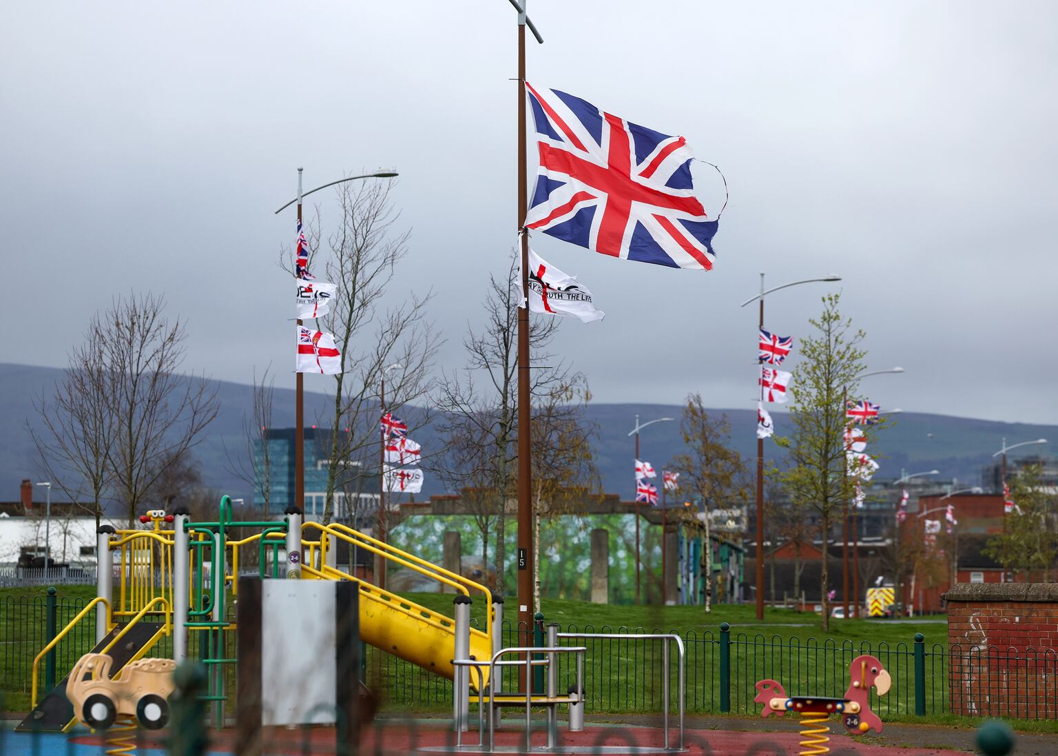 More flags appear in area where Belfast Council contractors removed ...