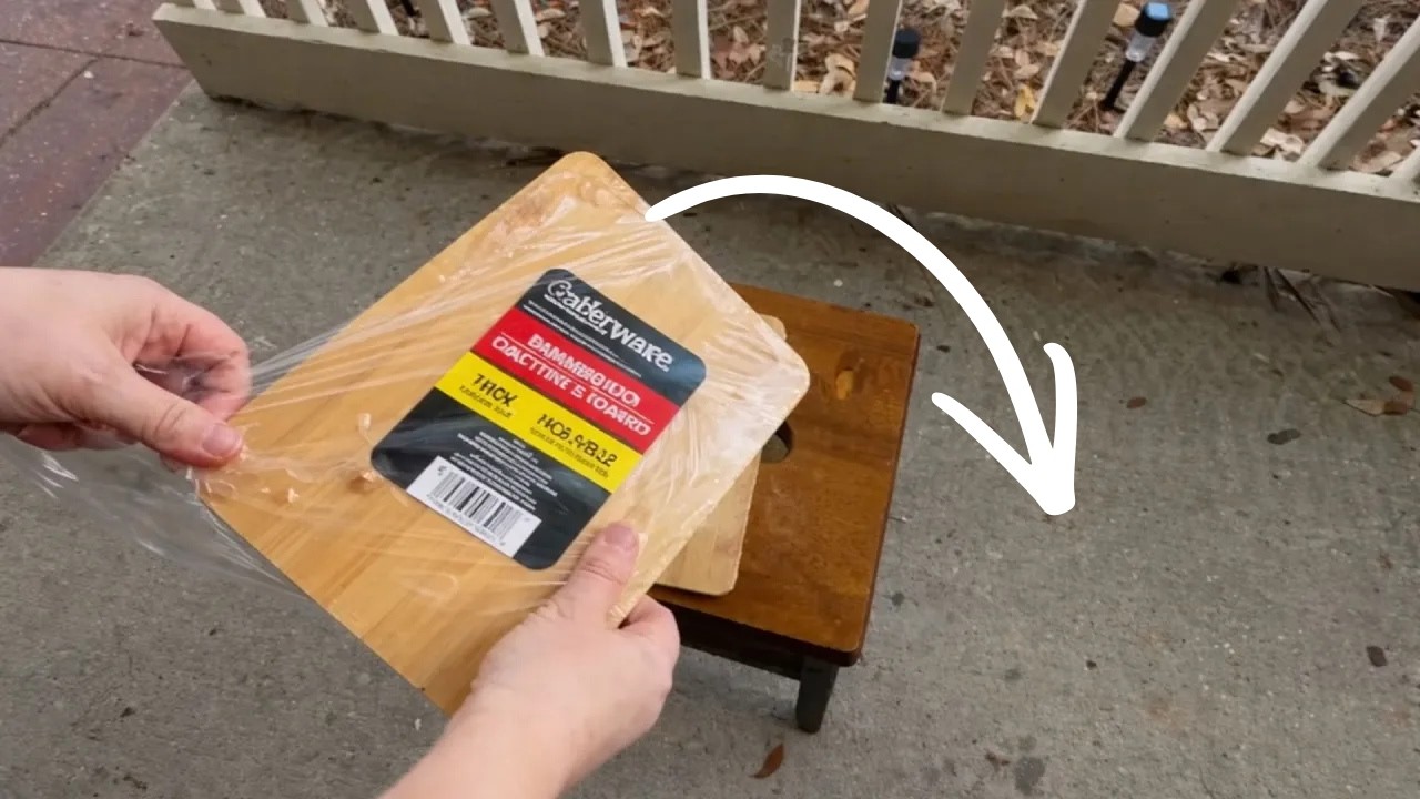 She puts a cutting board on her porch for this genius kitchen ...