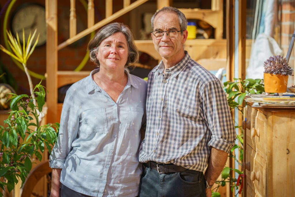 Couple save £2k-a-year in eco-community but must do 600hrs work to be there