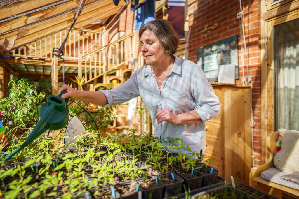 Couple save £2k-a-year in eco-community but must do 600hrs work to be there