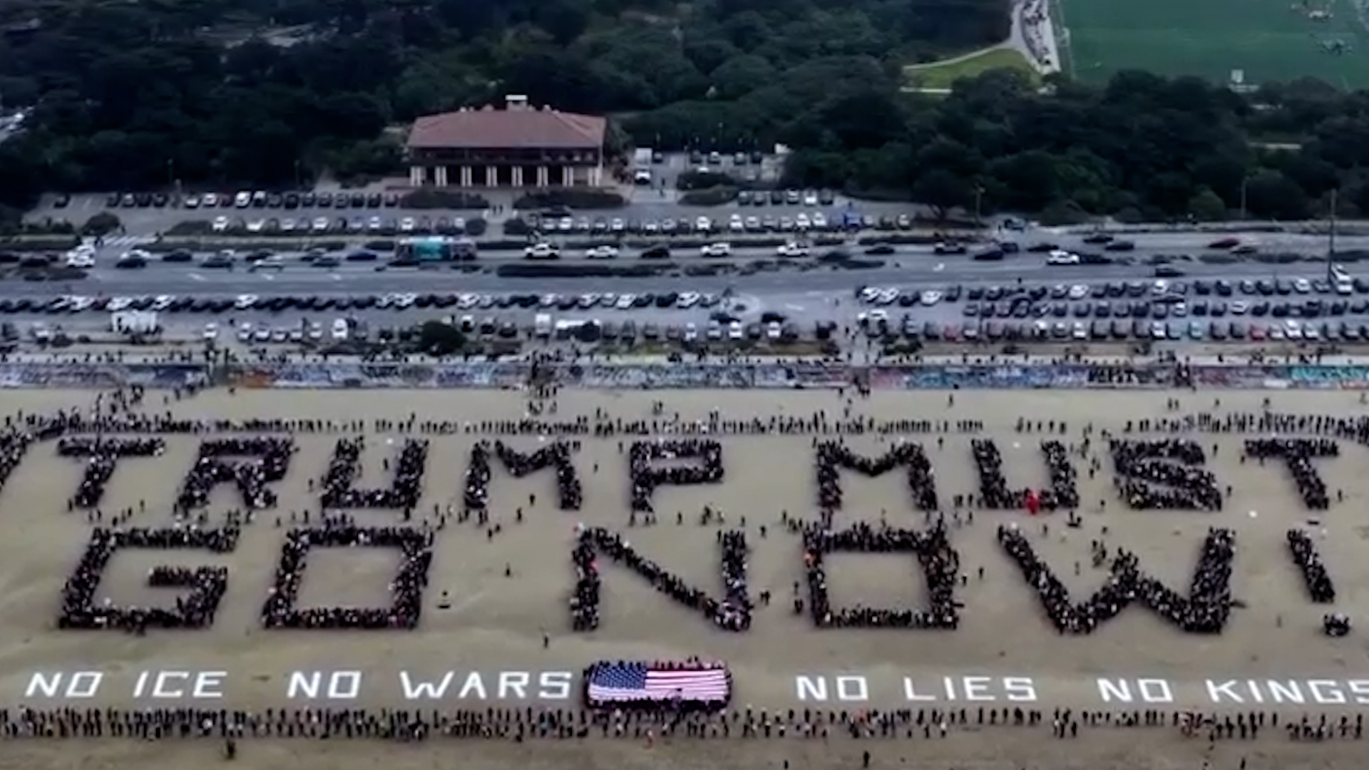 'Trump must go now': California protesters create human sign on beach