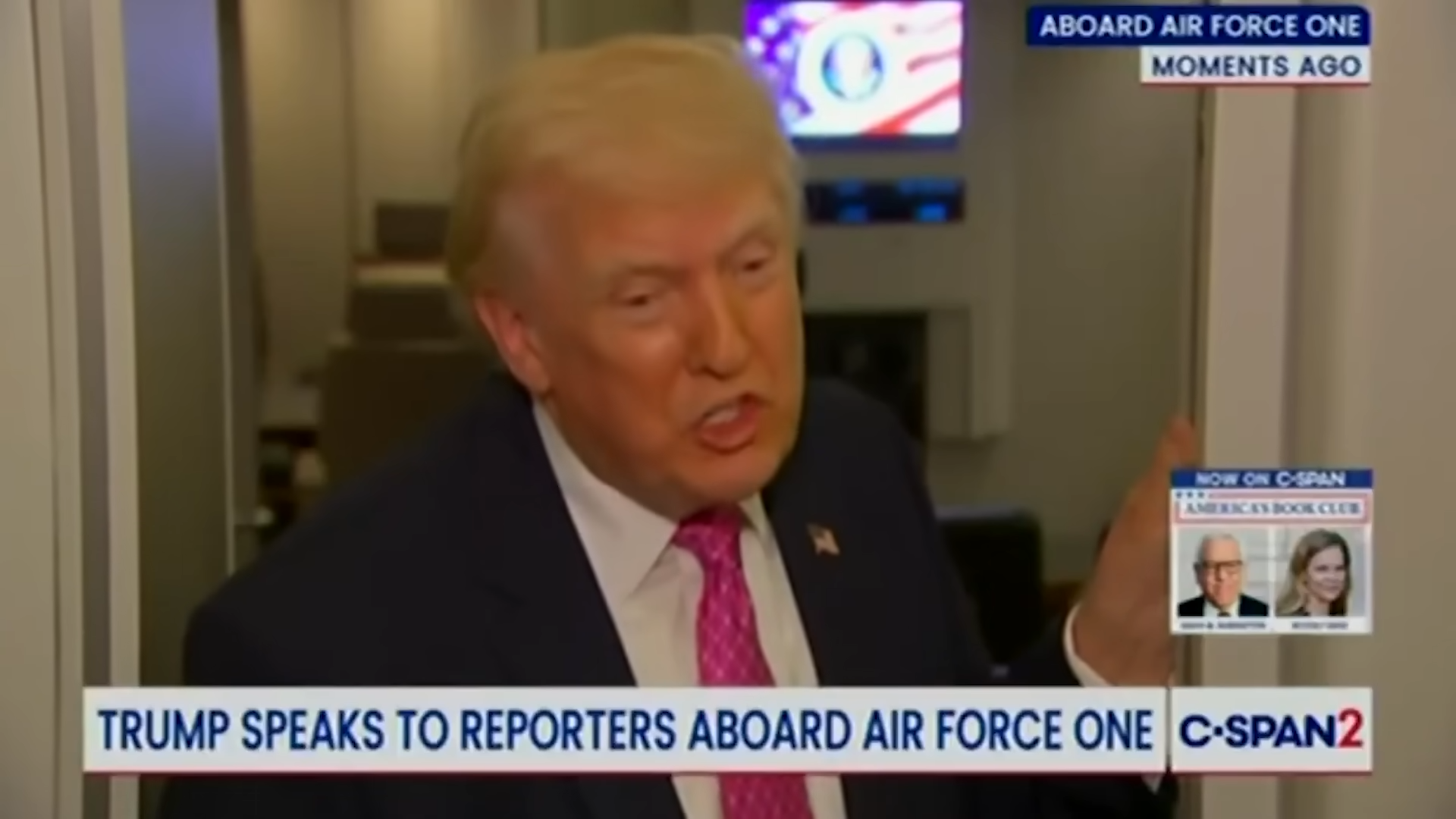 Trump struggles to respond mid-air – then press falls silent in shock