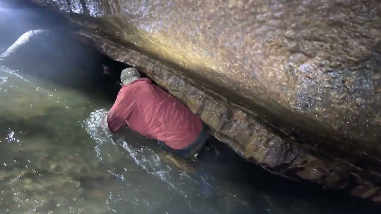 They slid into a flooded cave passage - then the rock closed in around them