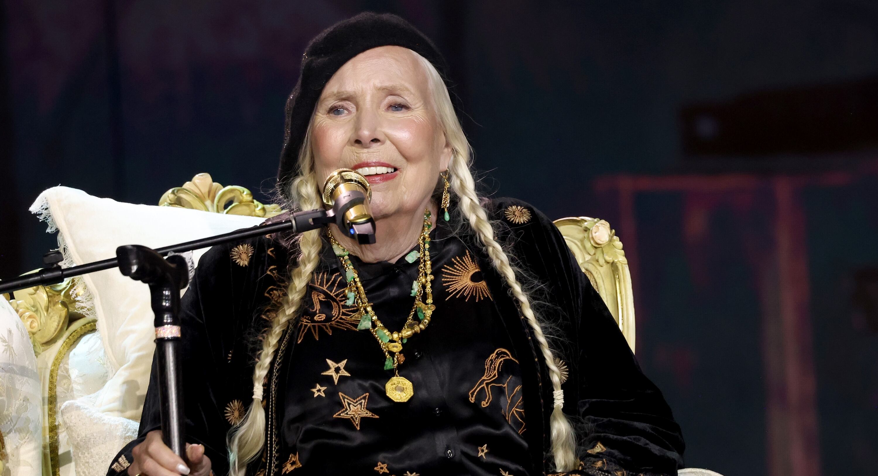 Reclusive singer, 82, steps out to bash Trump