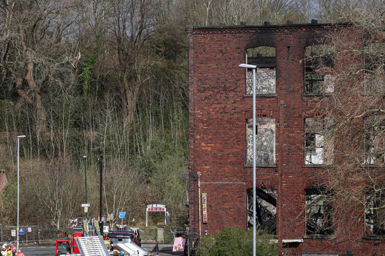 Fire crews 'scaling down' after devastating Middleton mill blaze