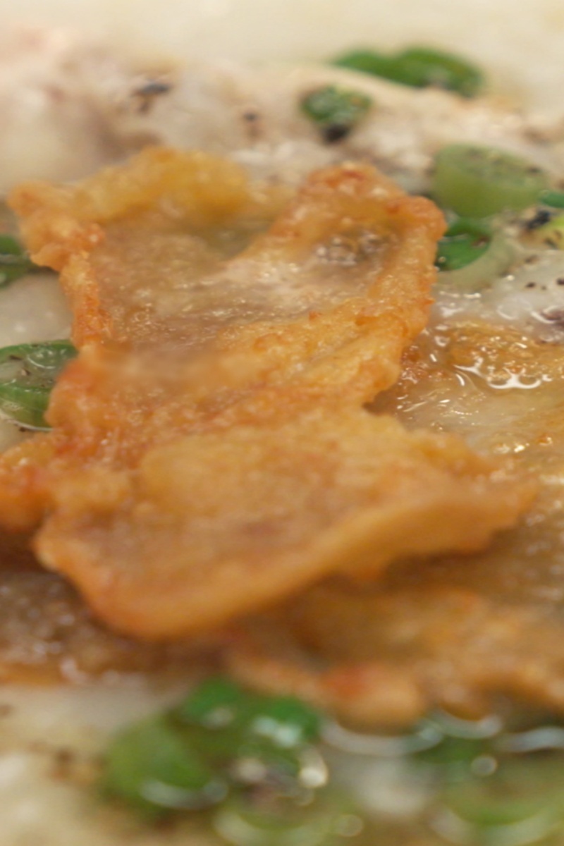 Ginger lemon chicken soup with crispy chicken skins