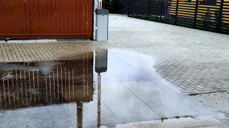 Puddles on your driveway are a warning sign you shouldn't ignore