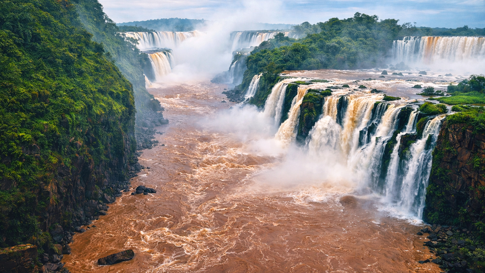 Huge waterfalls surrounded by jungle at Iguazu