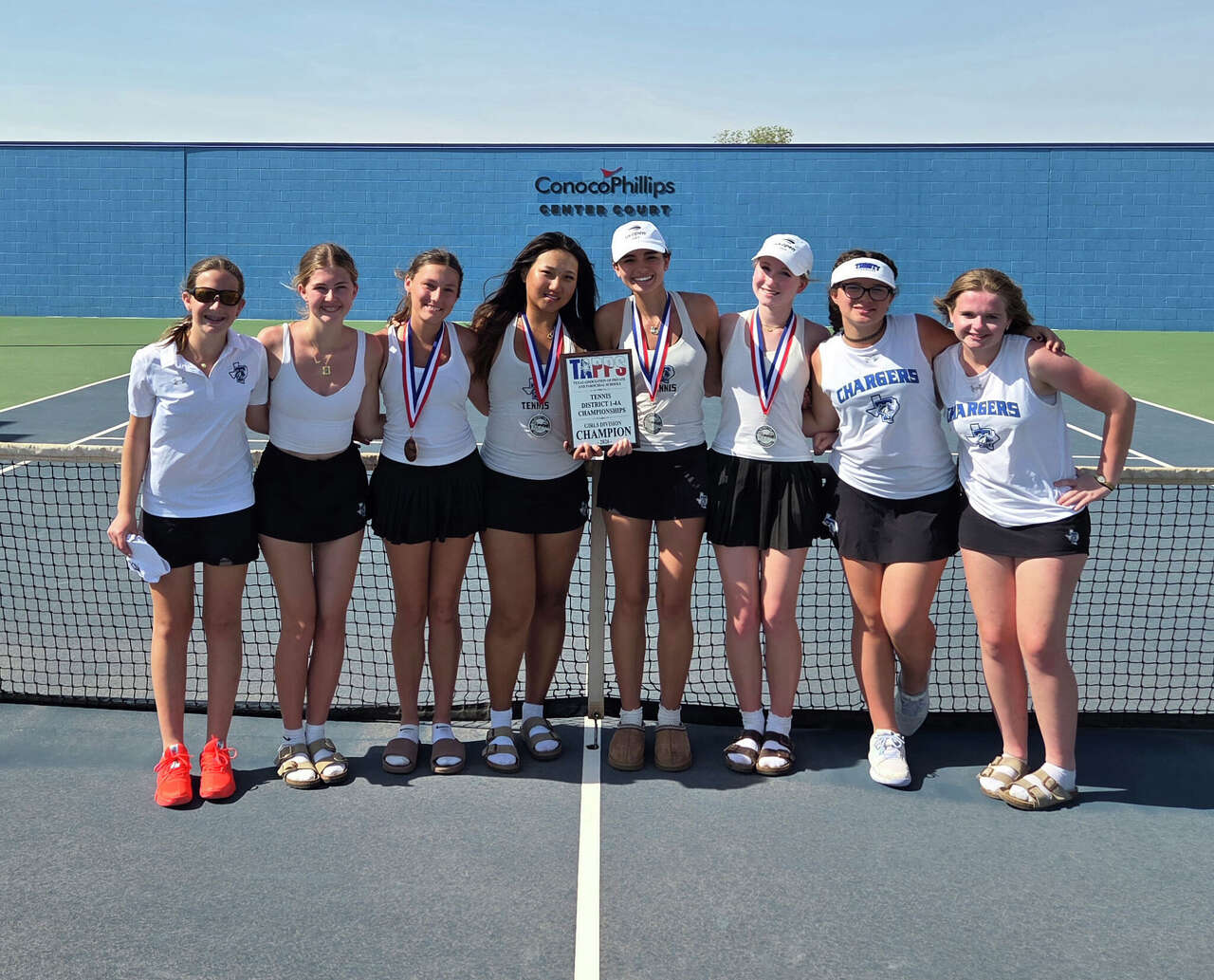 MCA boys, Trinity girls win district tennis titles