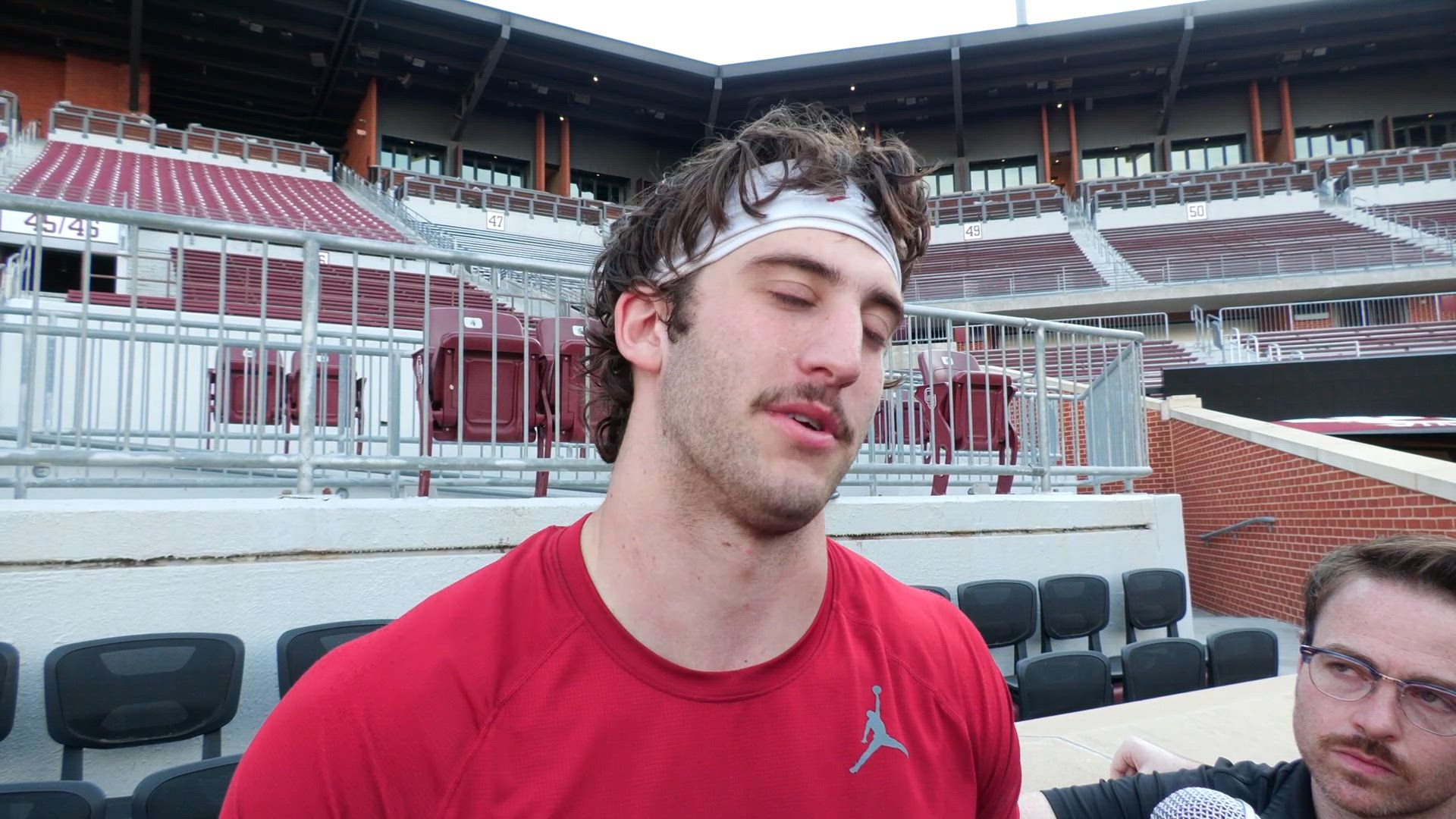 Oklahoma LB Taylor Heim speaks with the media after practice