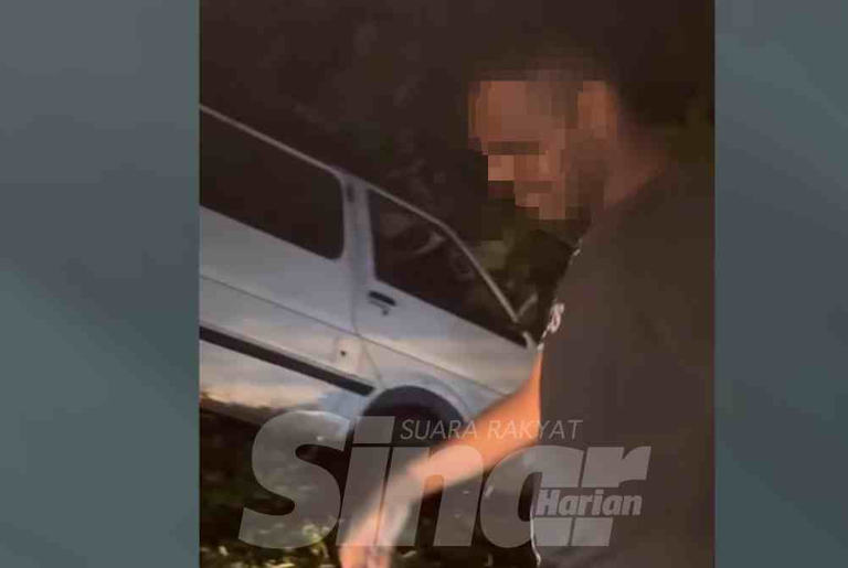Viral video shows suspected drunk driver after van skids off road in Jasin
