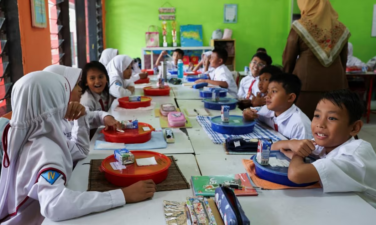 Indonesia cuts free meal budget as petrol prices soar