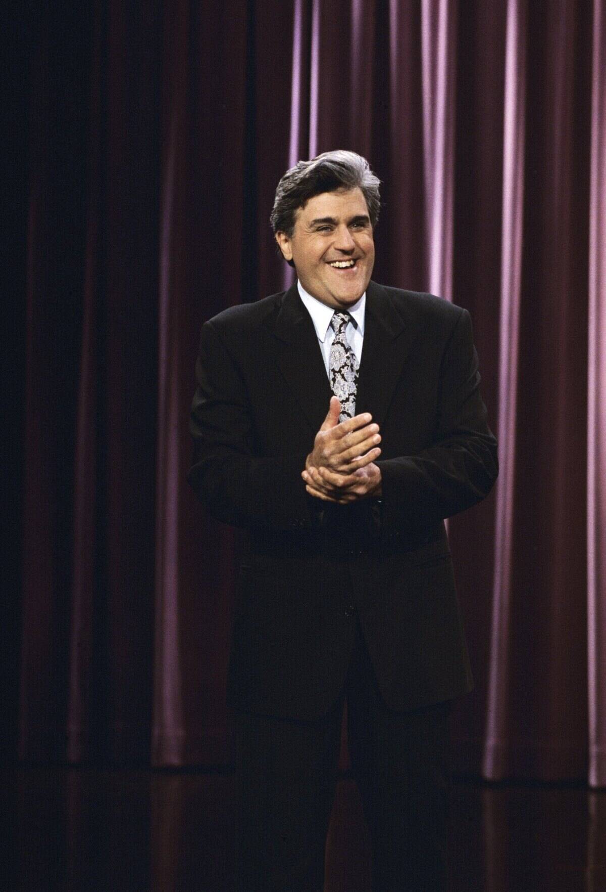 Can you identify famous TV shows by their hosts?