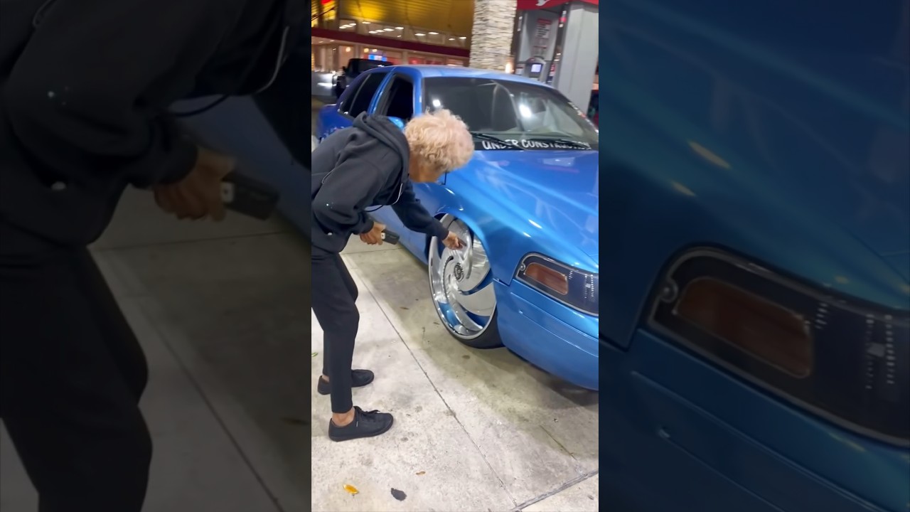 She Checking out the DUB Skates on the Bagged Ford Crown Vic