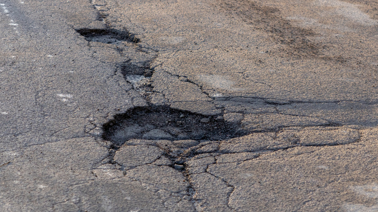Make a beat-up driveway look fresh again with these affordable fixes
