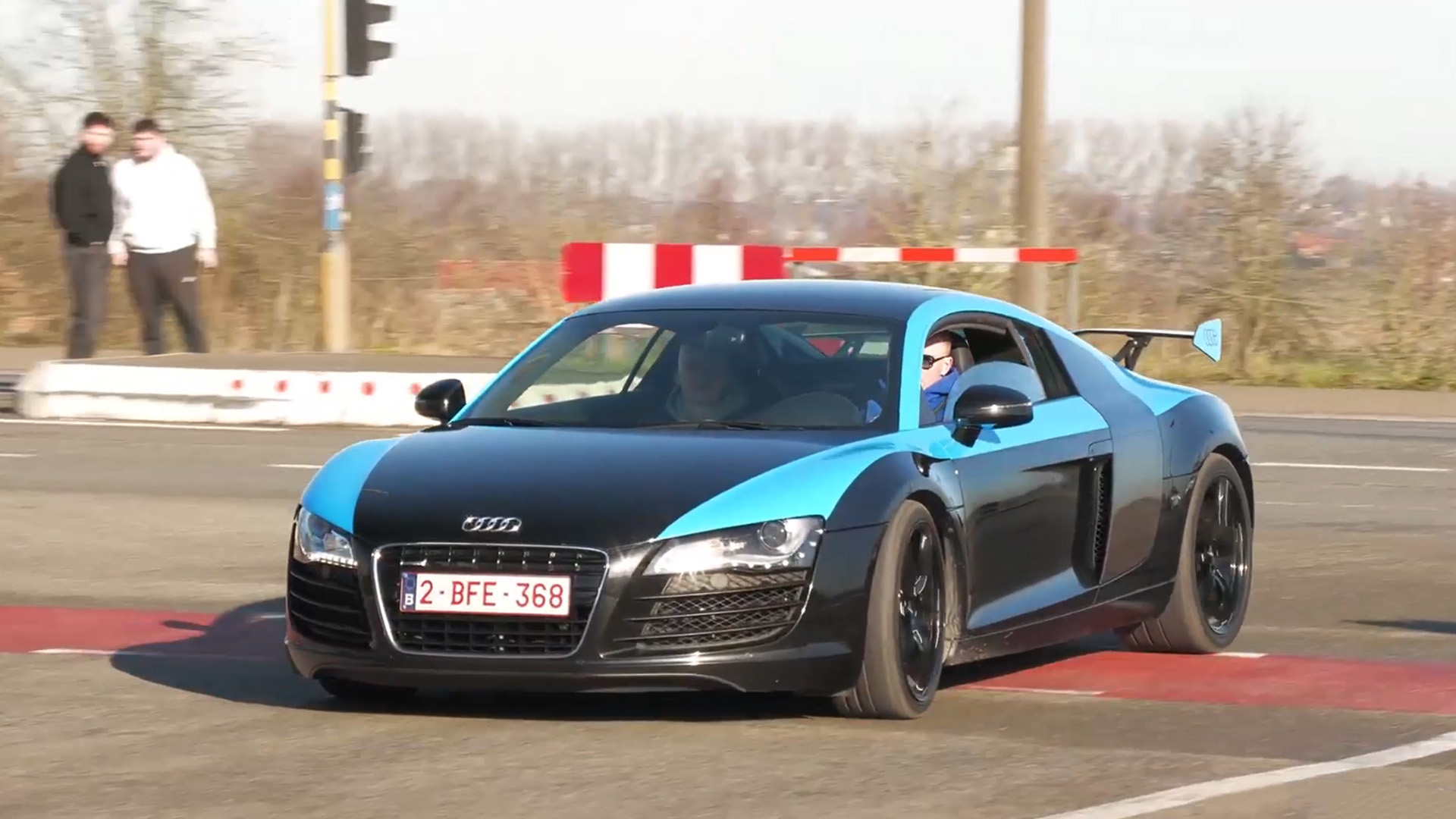 Audi R8 pushes too hard into this street corner
