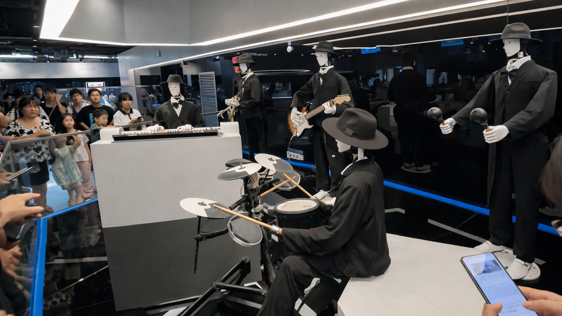A robot band playing instruments in a museum display